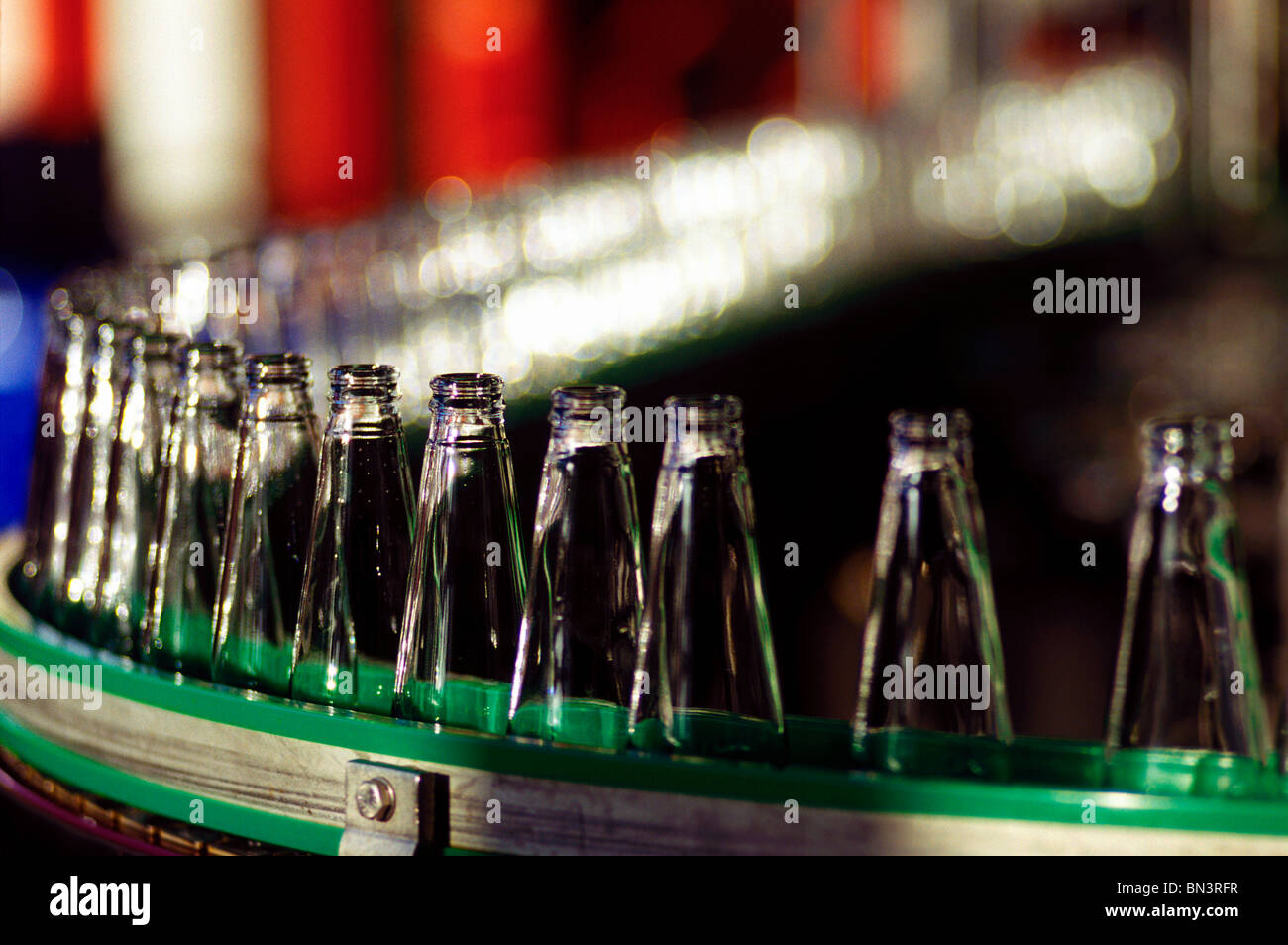 Bottles on production line in manufacturing plant Stock Photo - Alamy