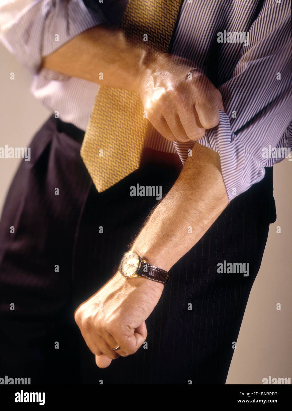 Man folding his arm hi-res stock photography and images - Alamy