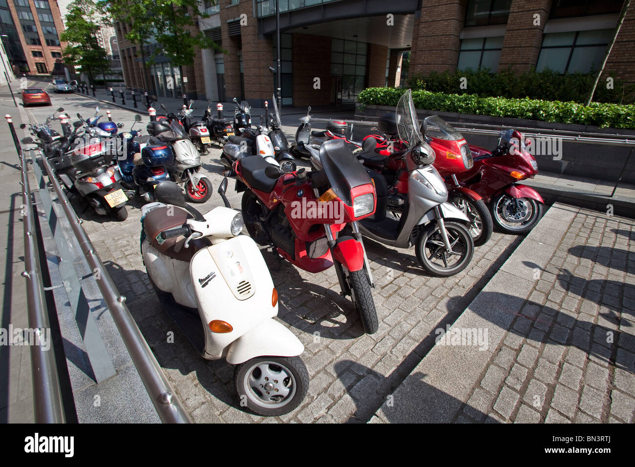 Motorbikes in traffic london hi-res stock photography and images - Alamy