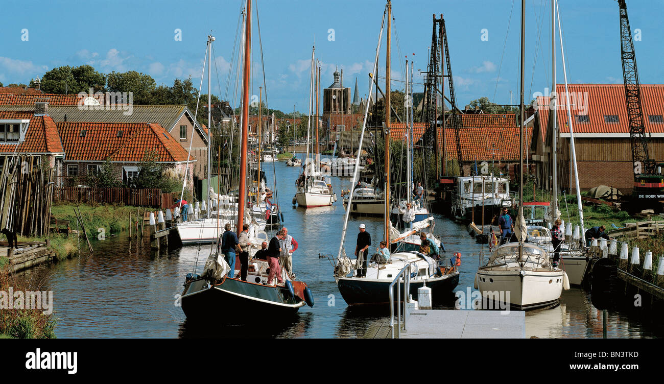 People on boats at harbor, Netherlands Stock Photo - Alamy