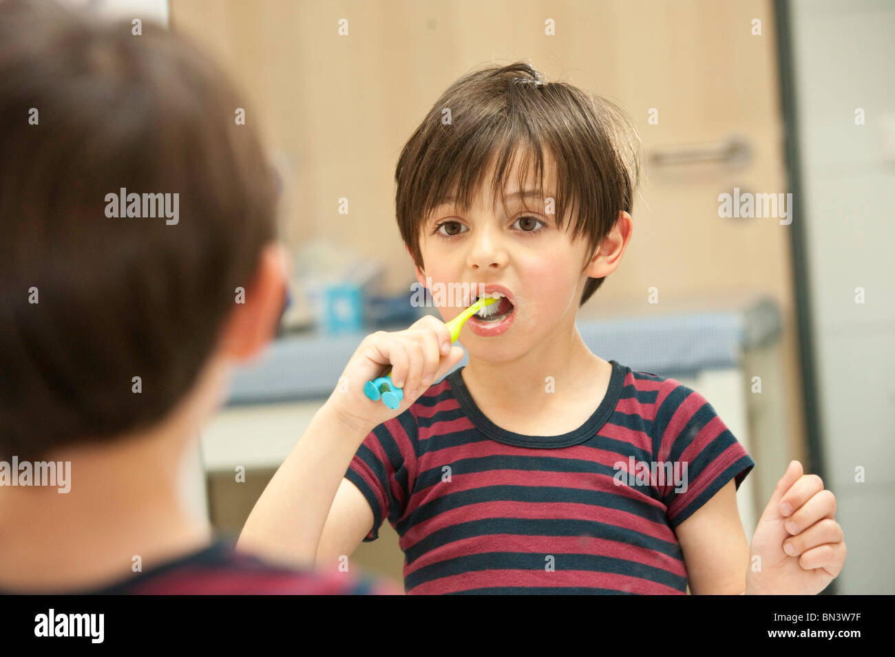 Young boy brushing his teeth Stock Photo - Alamy