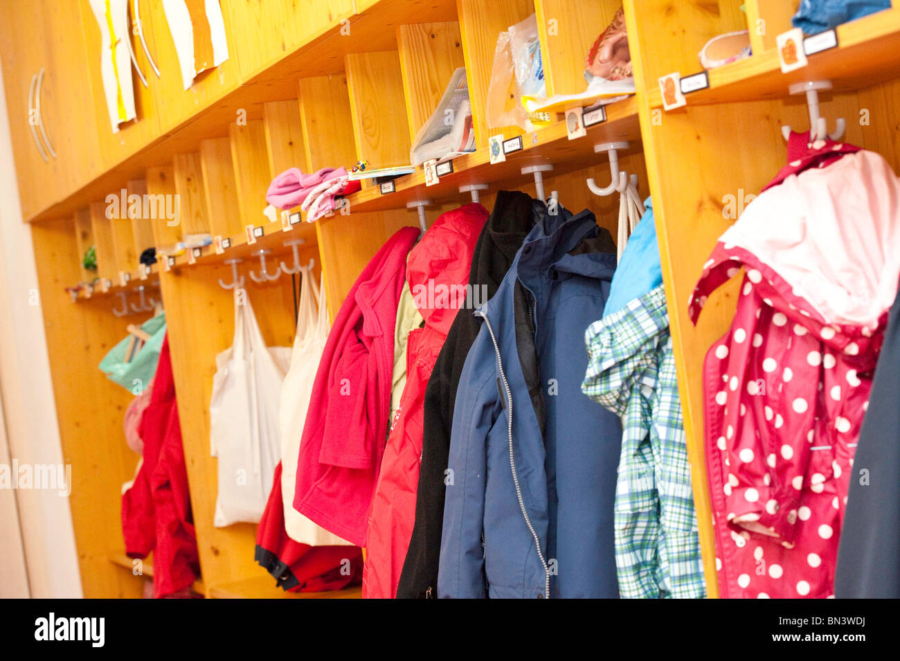 Cloakroom coat hi-res stock photography and images - Alamy
