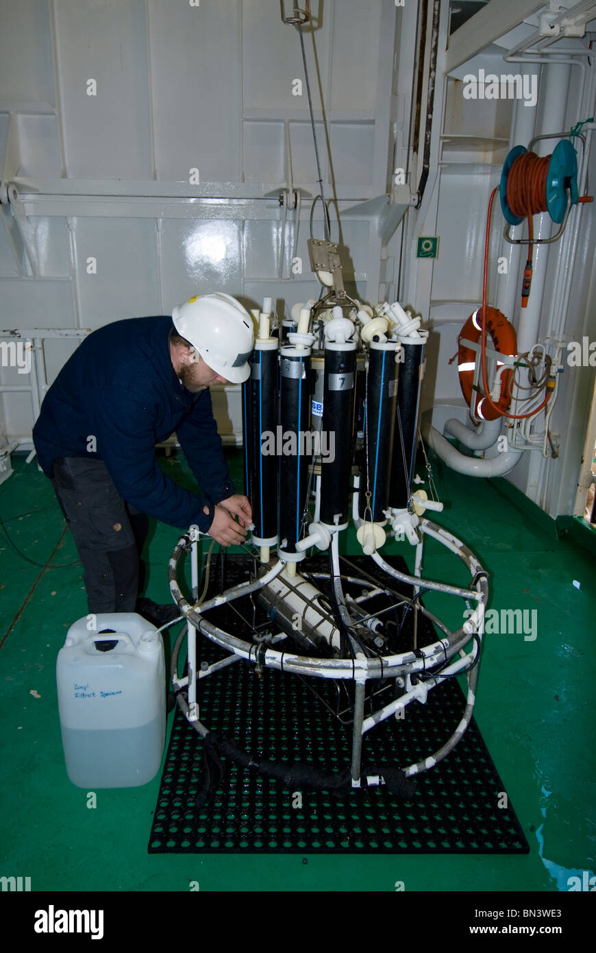 Scientist taking water samples from the South Atlantic Ocean, Bouvet ...