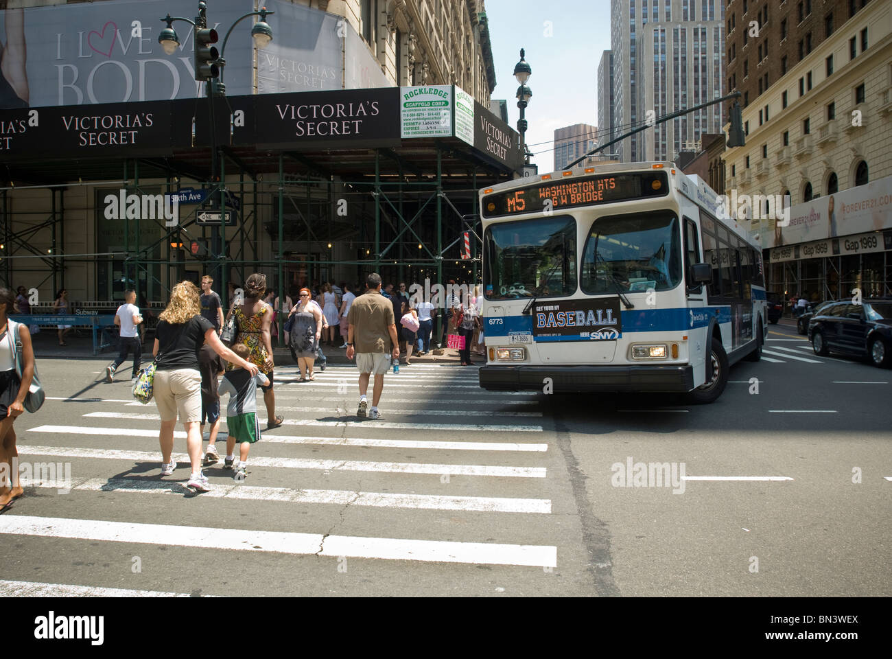 A New York City bus turns in Herald Square in New York on Saturday ...