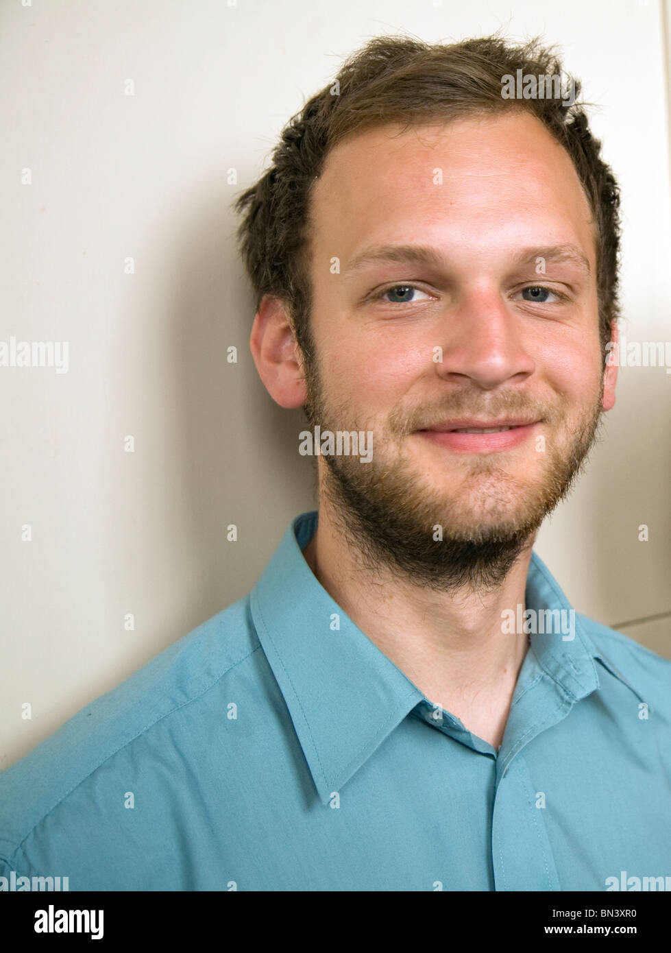 Wearing blue shirt hi-res stock photography and images - Alamy