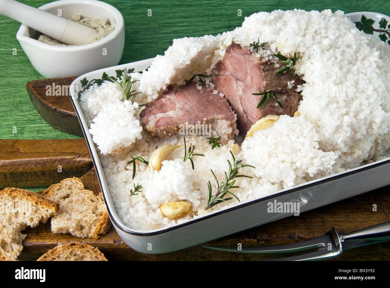 Roast pork sirloin in salt crust Stock Photo - Alamy