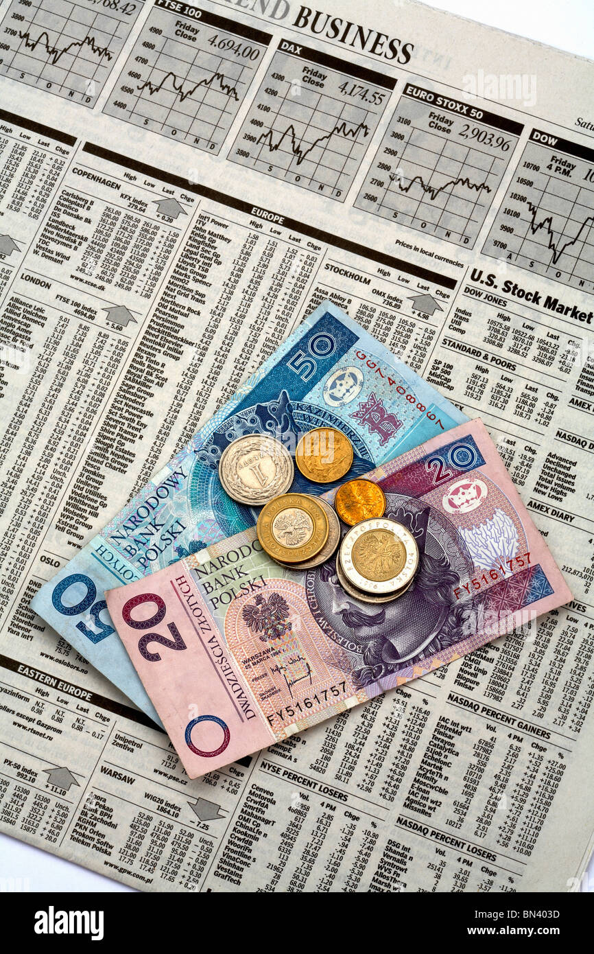 Polish Zloty Currency laying on financial stock price page of newspaper ...