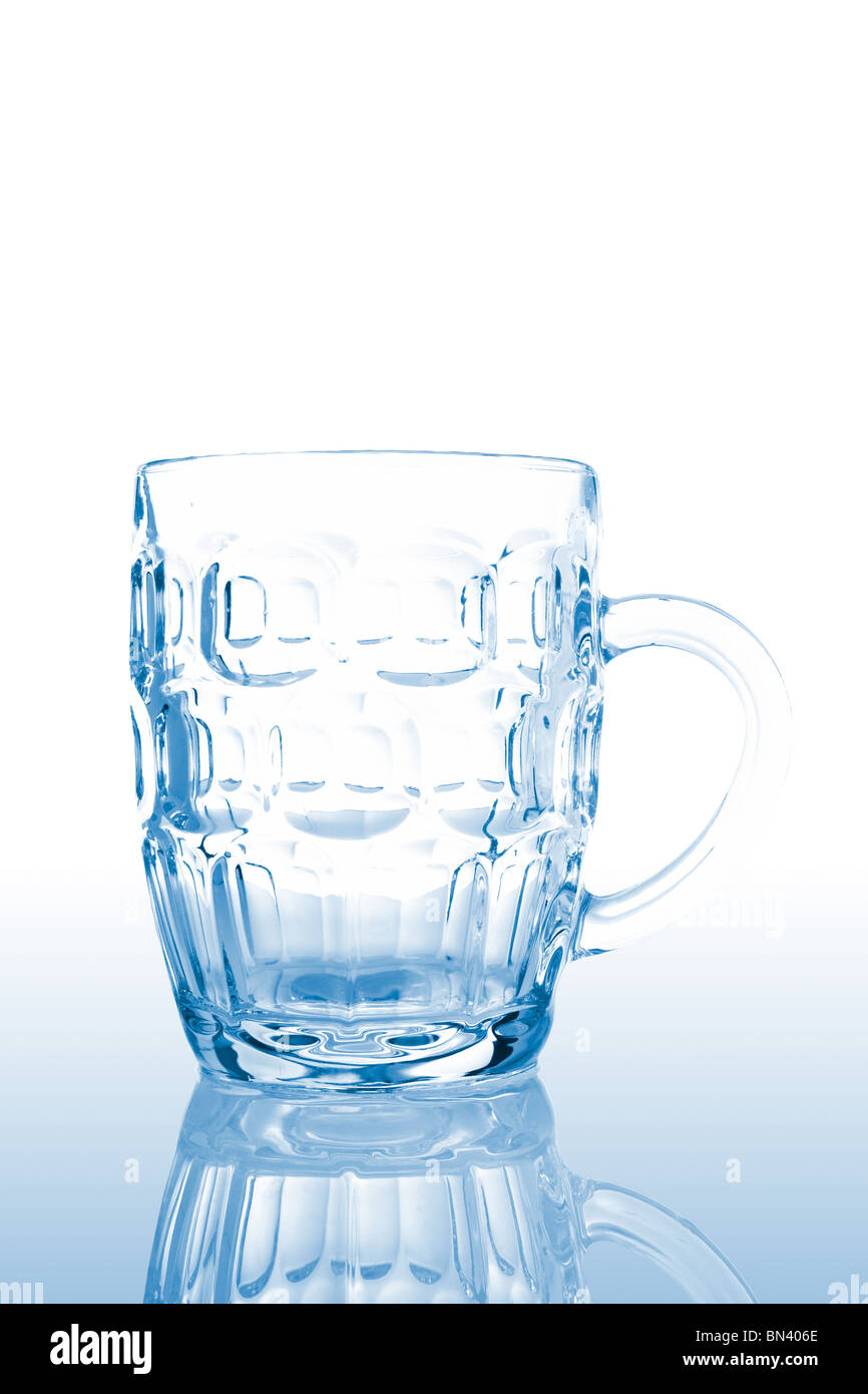 Empty pitcher reflected on a white background Stock Photo - Alamy