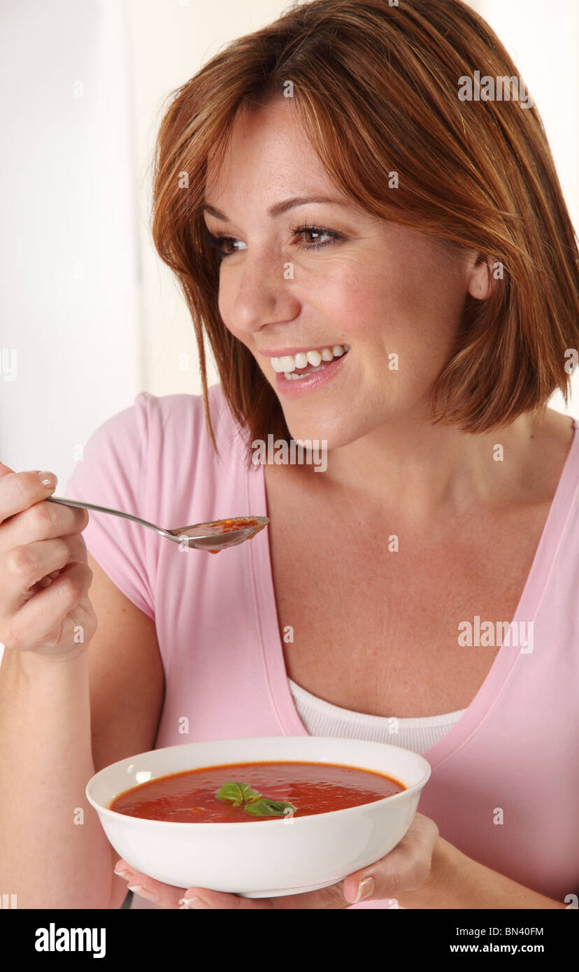 WOMAN EATING SOUP Stock Photo - Alamy