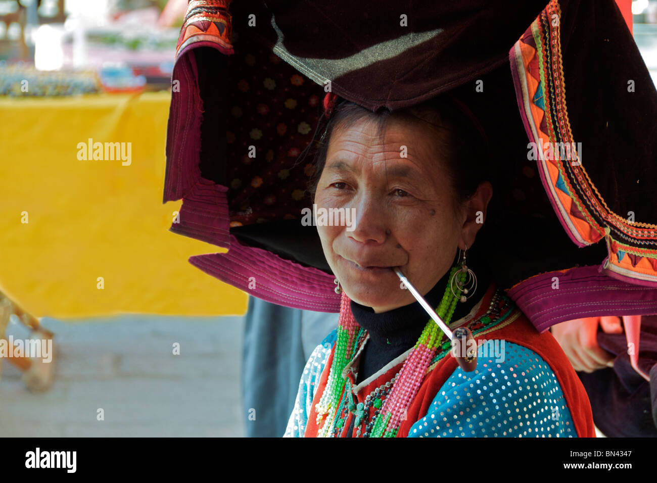 Asian woman smoking pipe hi-res stock photography and images - Alamy