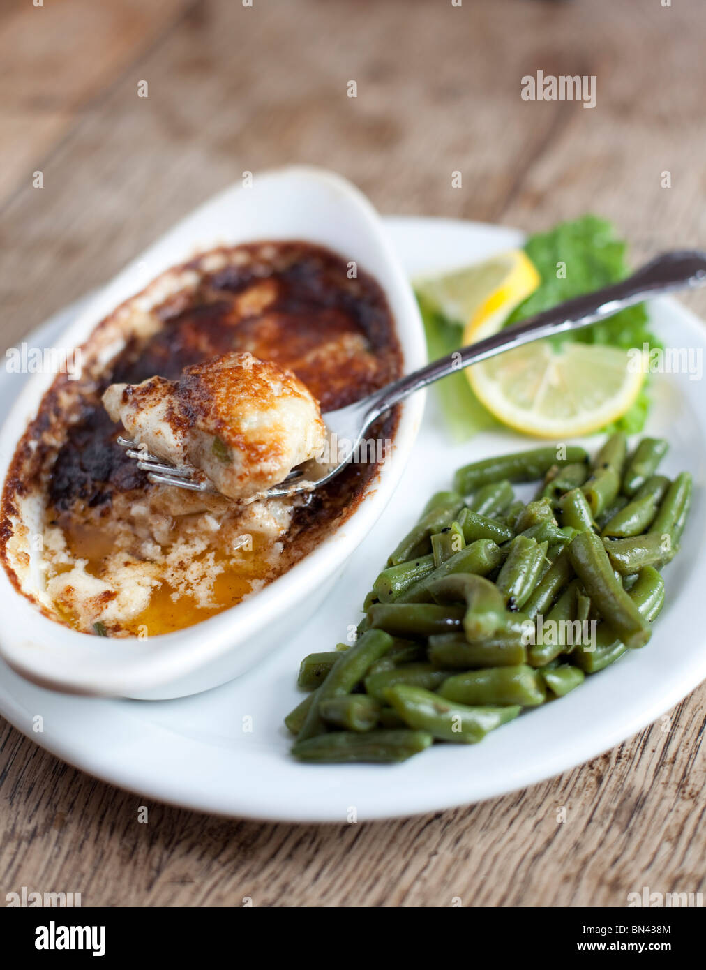 Poached fillet of U.S. Farm-raised Catfish fillet gratineed with a ...
