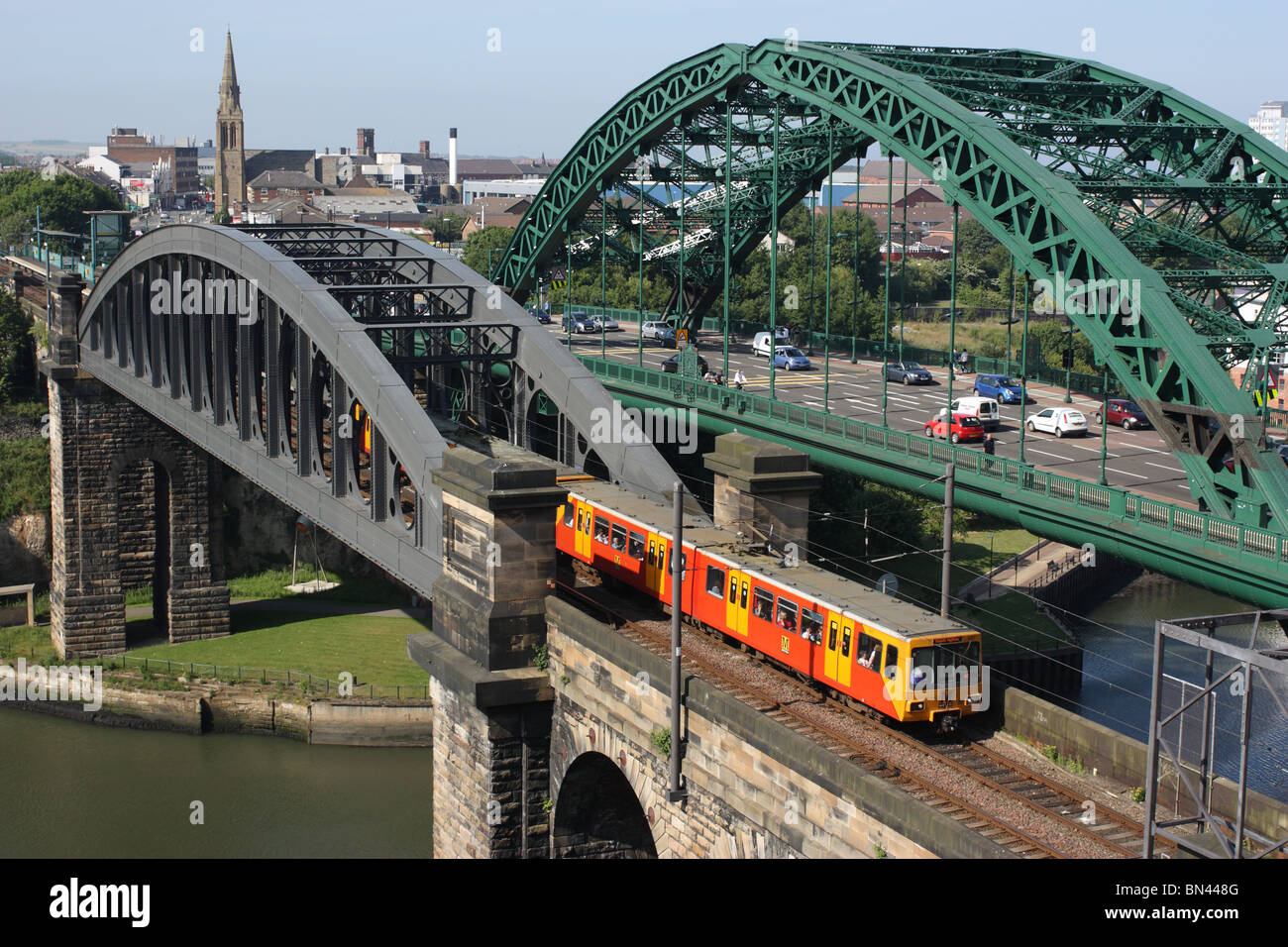 A Tyne and Wear Metro train heads south over the Wearmouth railway ...