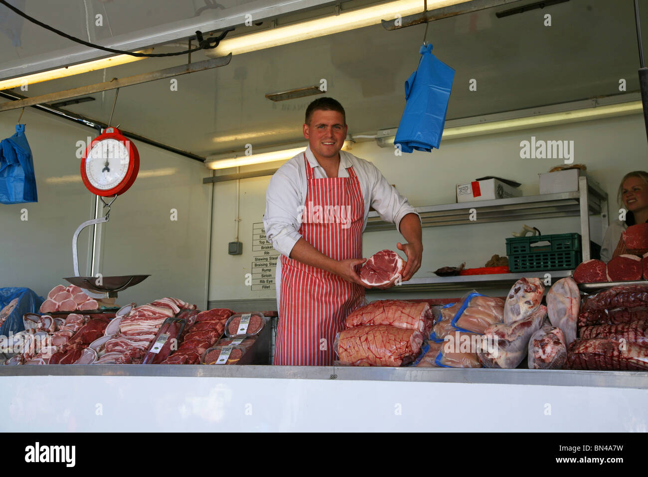 Butcher selling his produce at Dorchester Market Stock Photo - Alamy