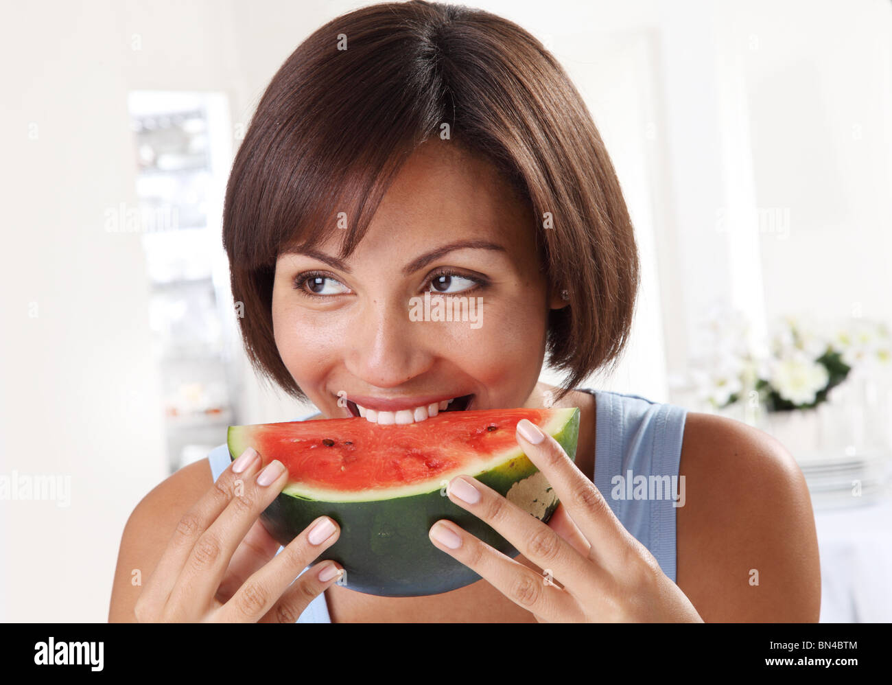 African girl eating watermelon hi-res stock photography and images - Alamy