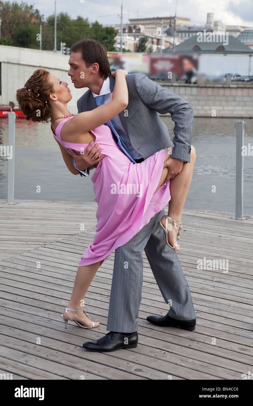 Happy newlyweds dancing river hi-res stock photography and images - Alamy