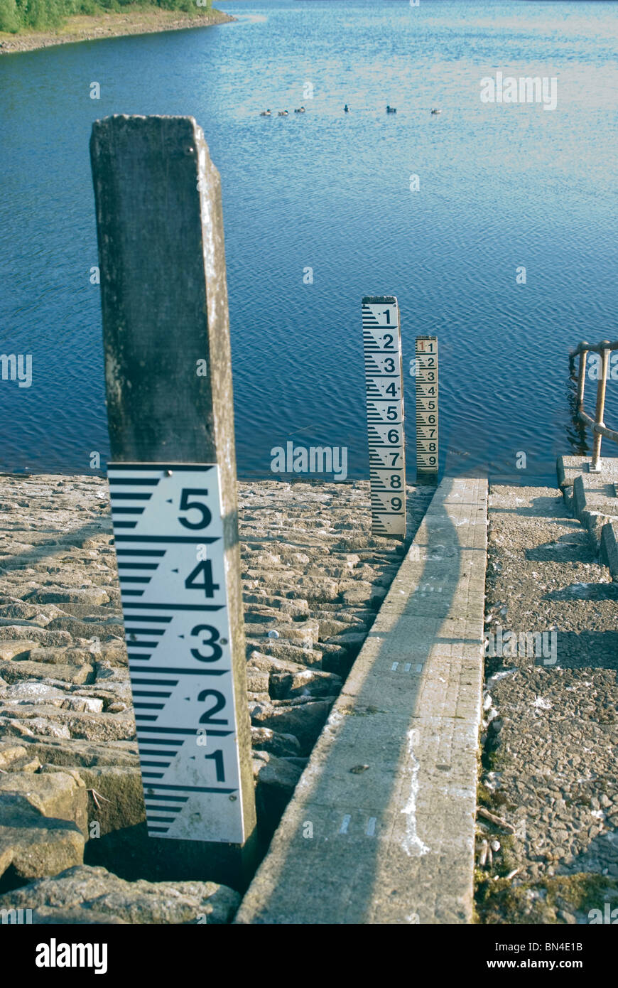 Water level markers on Anglezarke Reservoir, Lancashire, indicating a ...