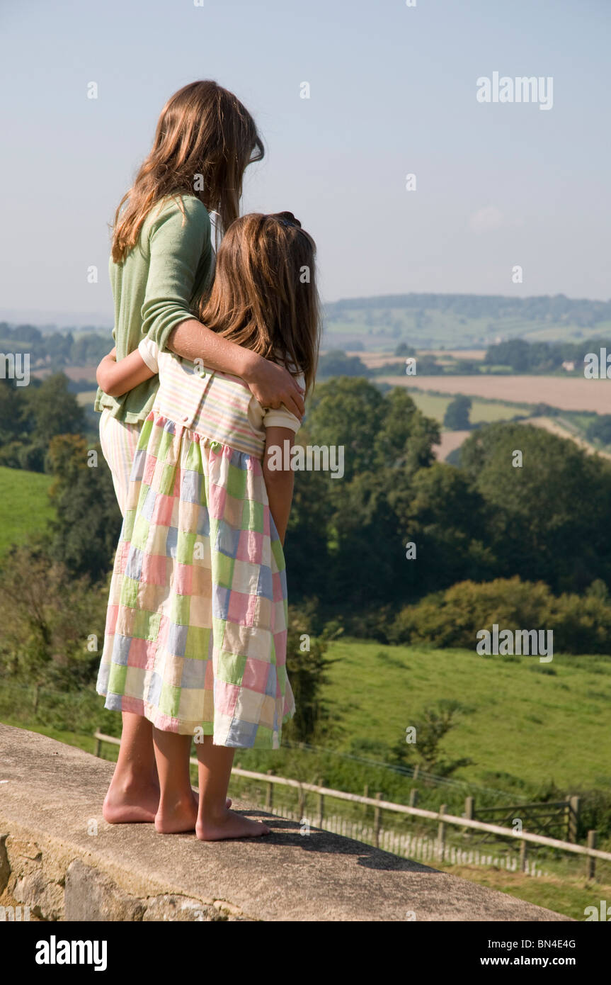 Girls arms around each other hi-res stock photography and images - Alamy