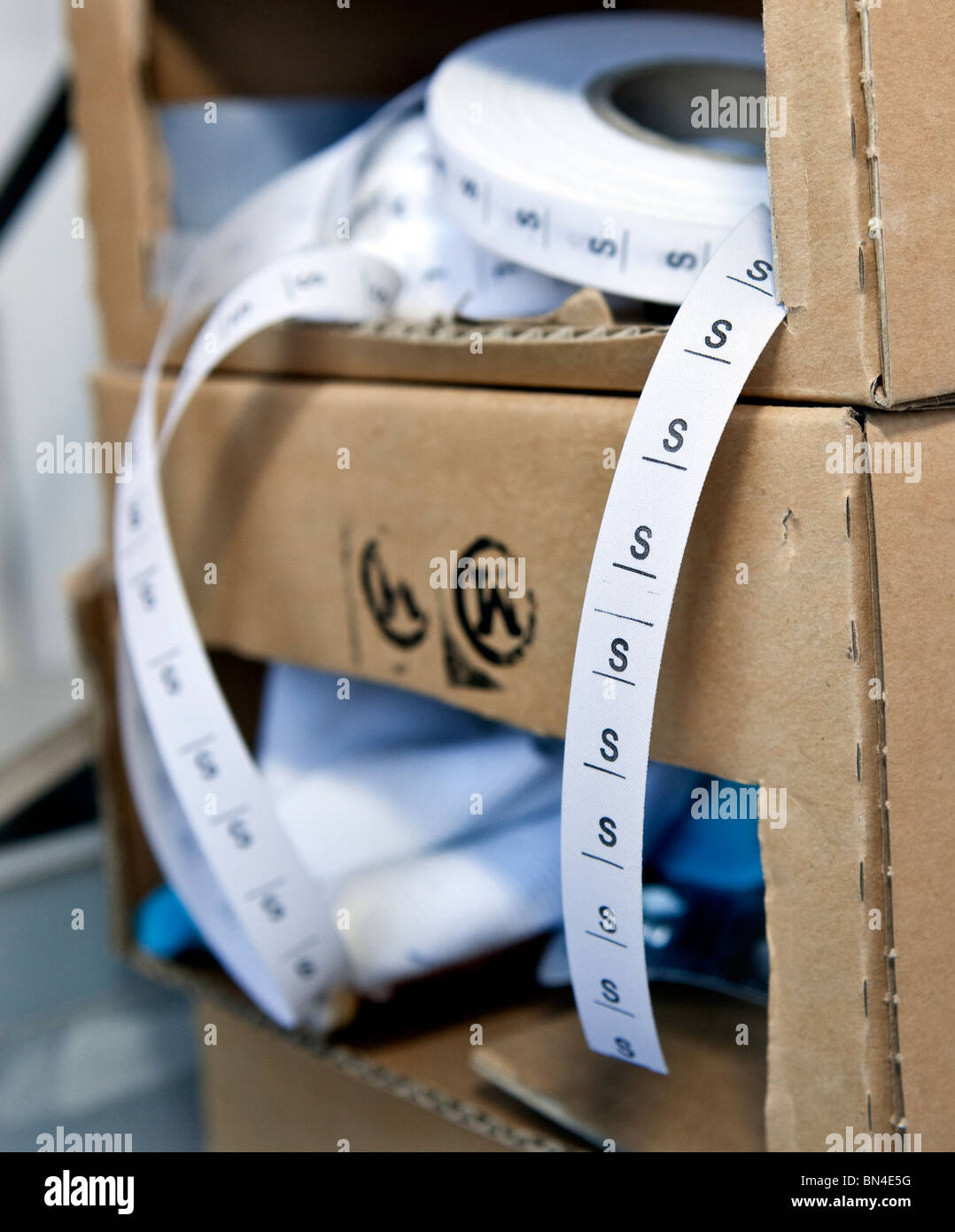 'Small' size labels for clothes Stock Photo - Alamy
