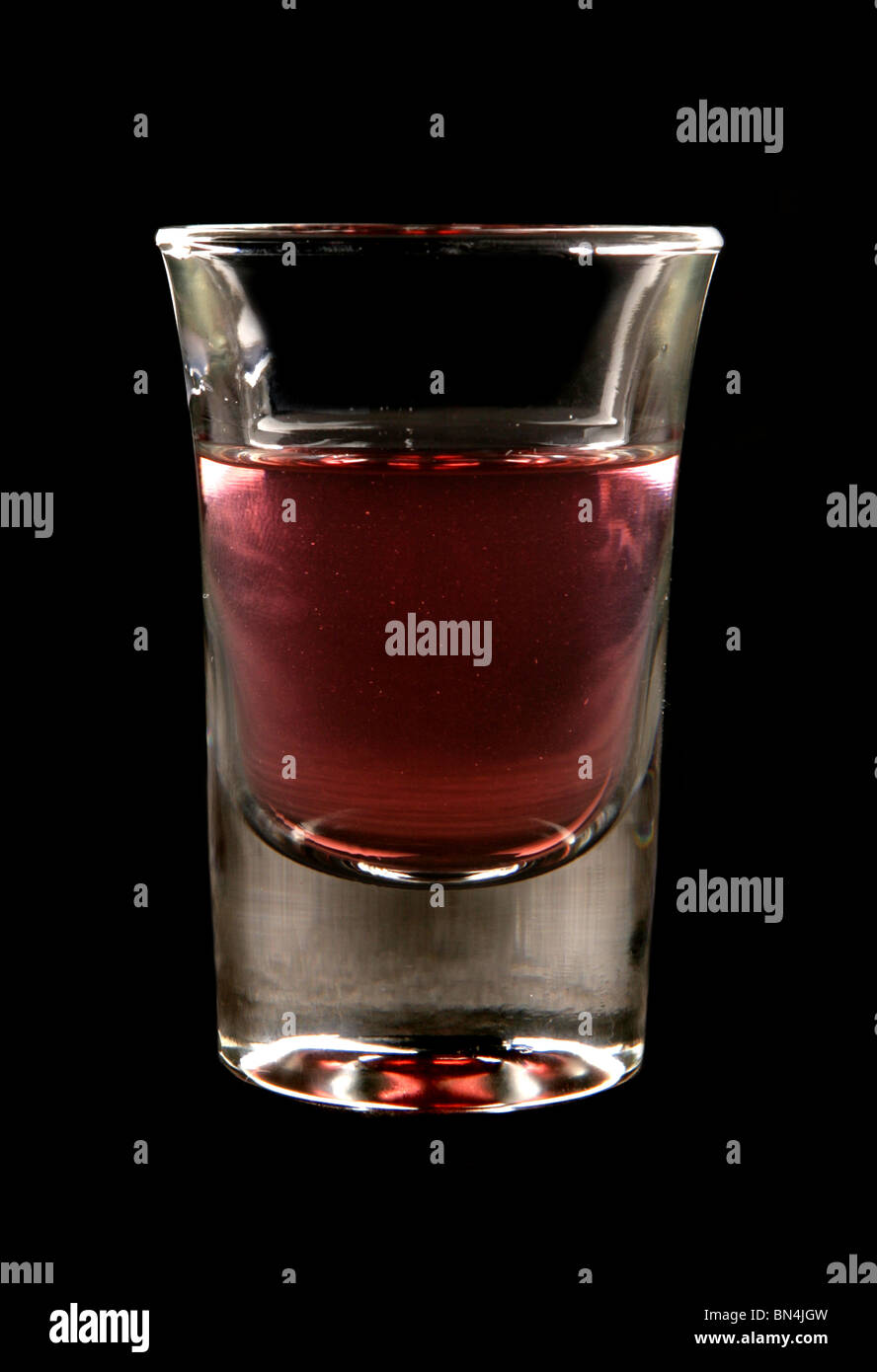 Purple alcoholic shot in studio Stock Photo - Alamy