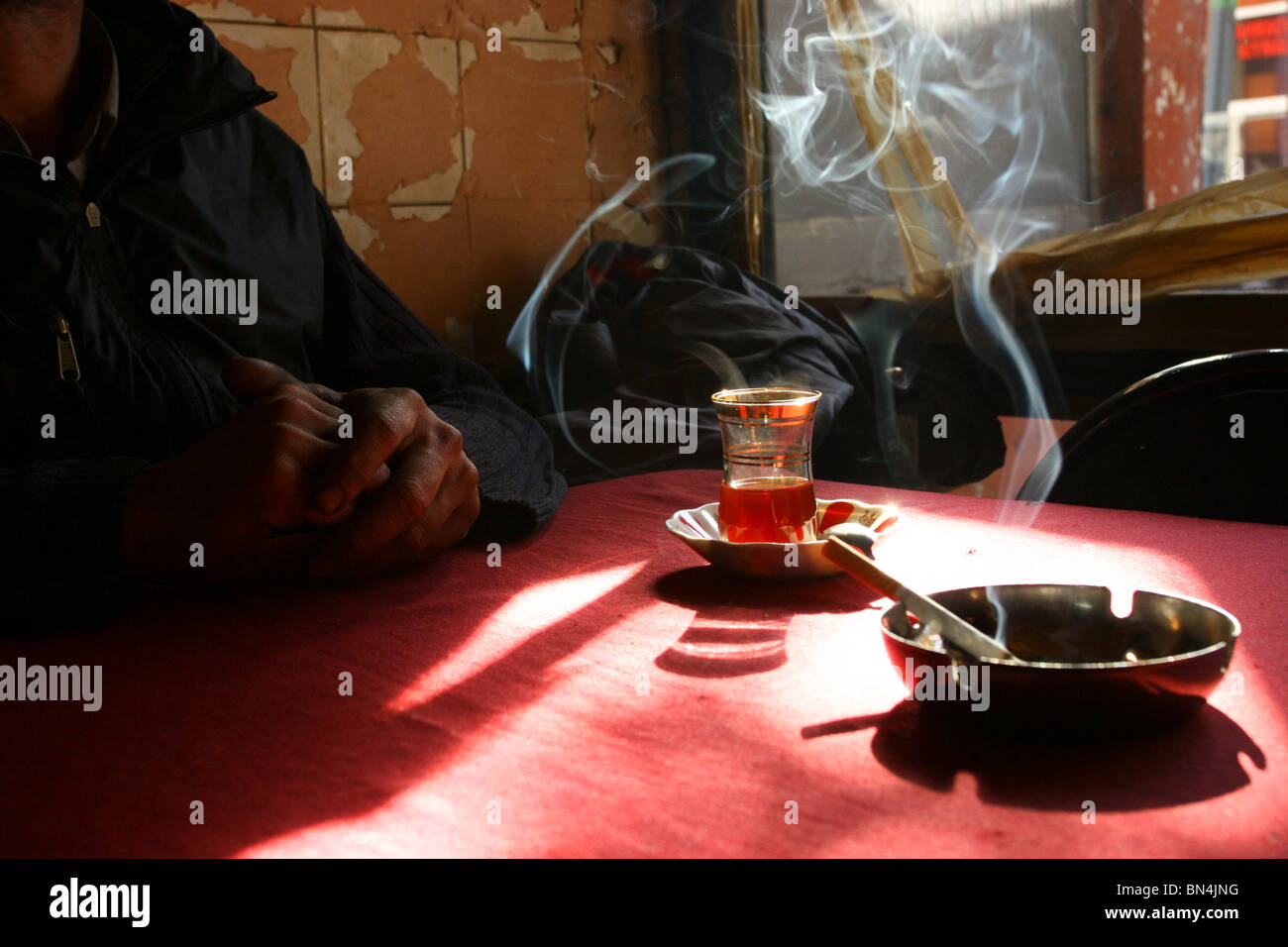 Turkey, Istanbul , The smoke from a cigarette is rising at a ...