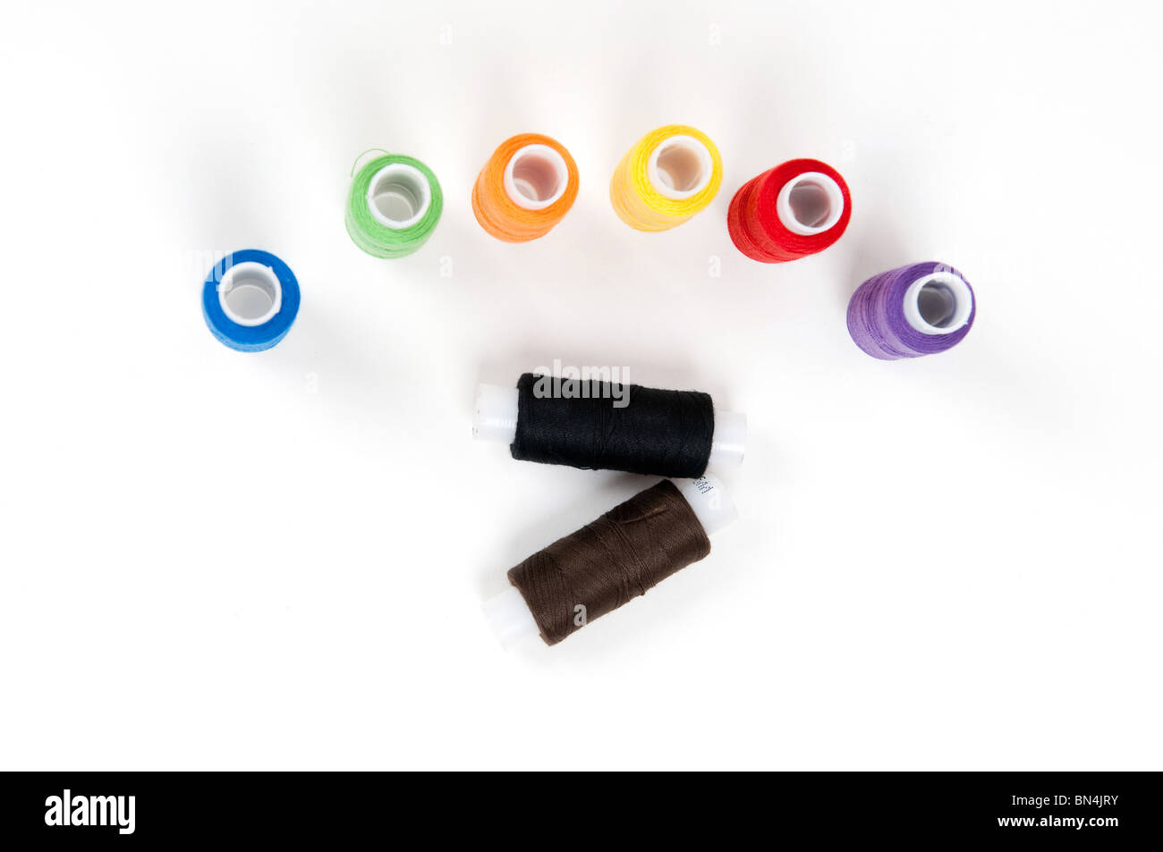 Set of sewing threads on white backgrounds Stock Photo - Alamy