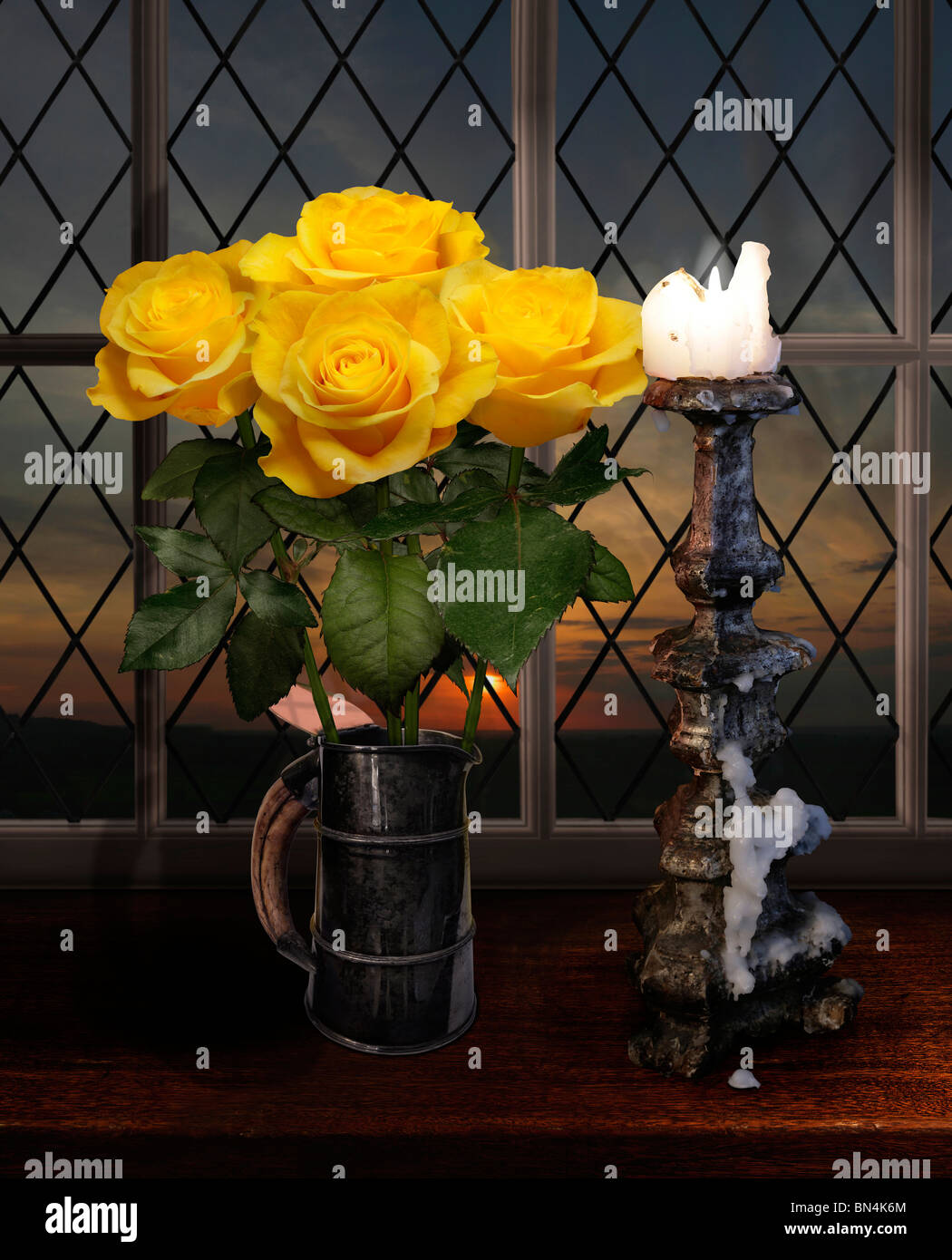 yellow roses and candelabra with sunset on the background Stock Photo ...