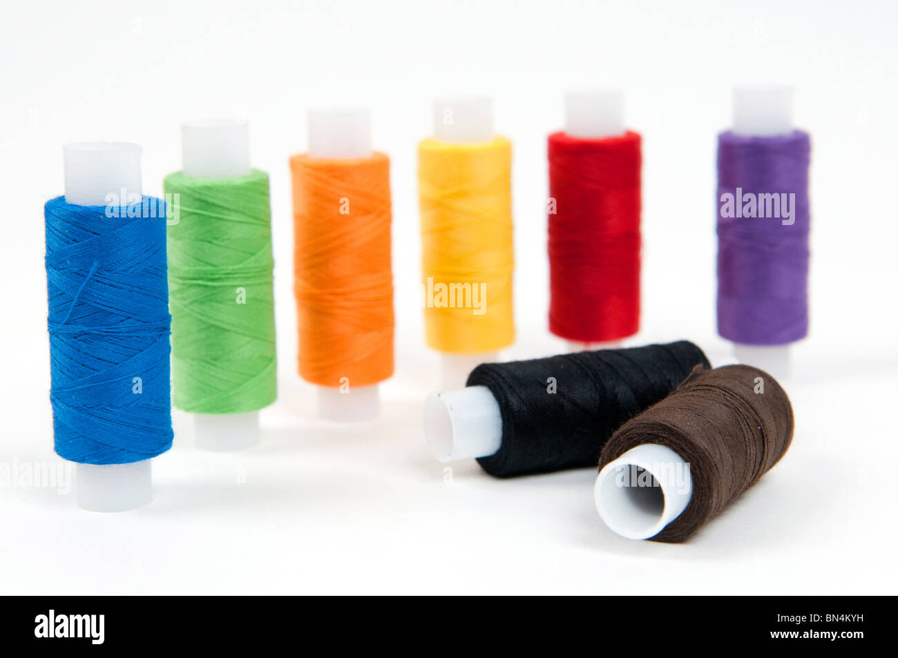 Set of sewing threads on white backgrounds Stock Photo - Alamy