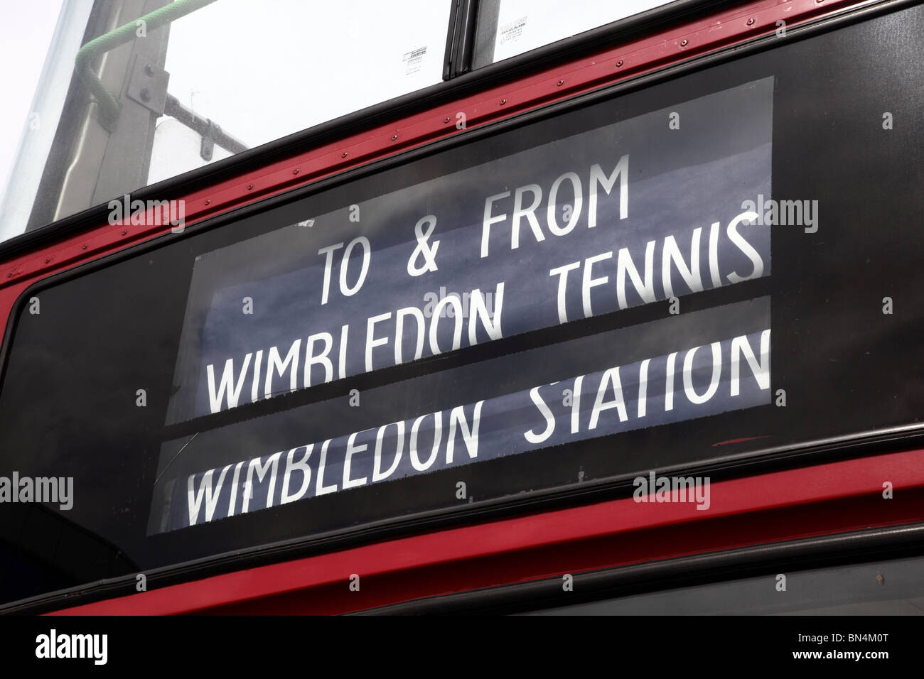 Sign on one of the Wimbledon Tennis Tournament shuttle buses during ...