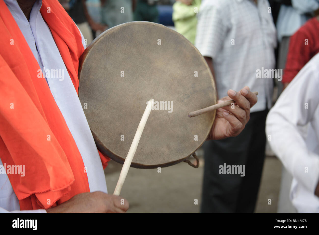 Man playing dafli hand drum played two sticks hi-res stock photography ...