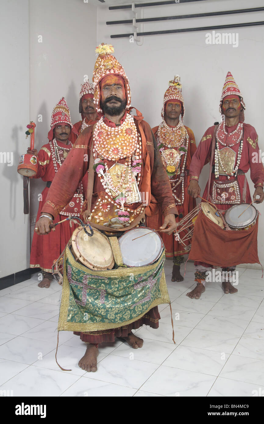 Gondhali from Solapur District playing drums ; Maharashtra ; India MR ...