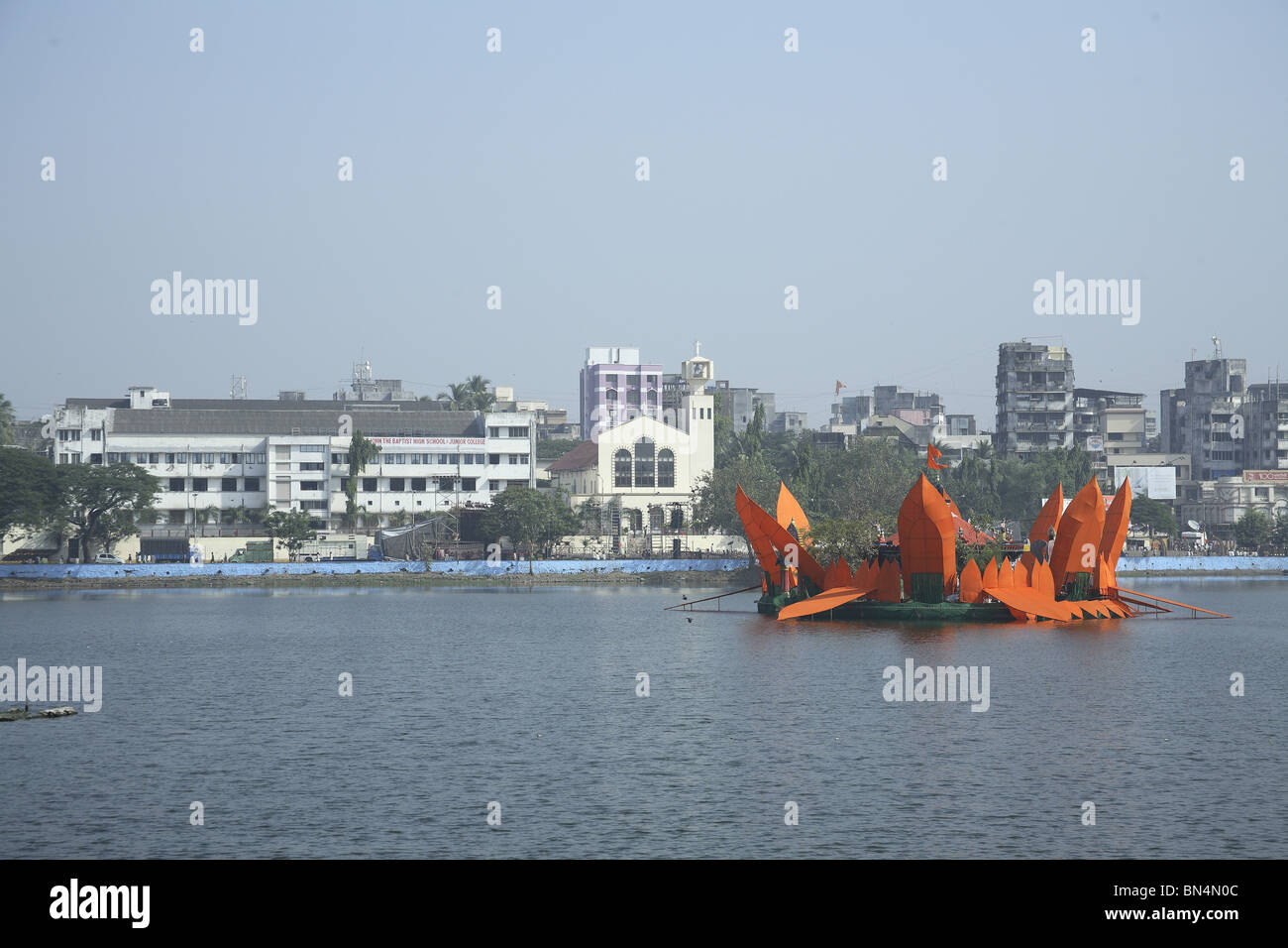 Man made Orange Lotus surrounding the Mahadev Mandir in Masunda Lake ...