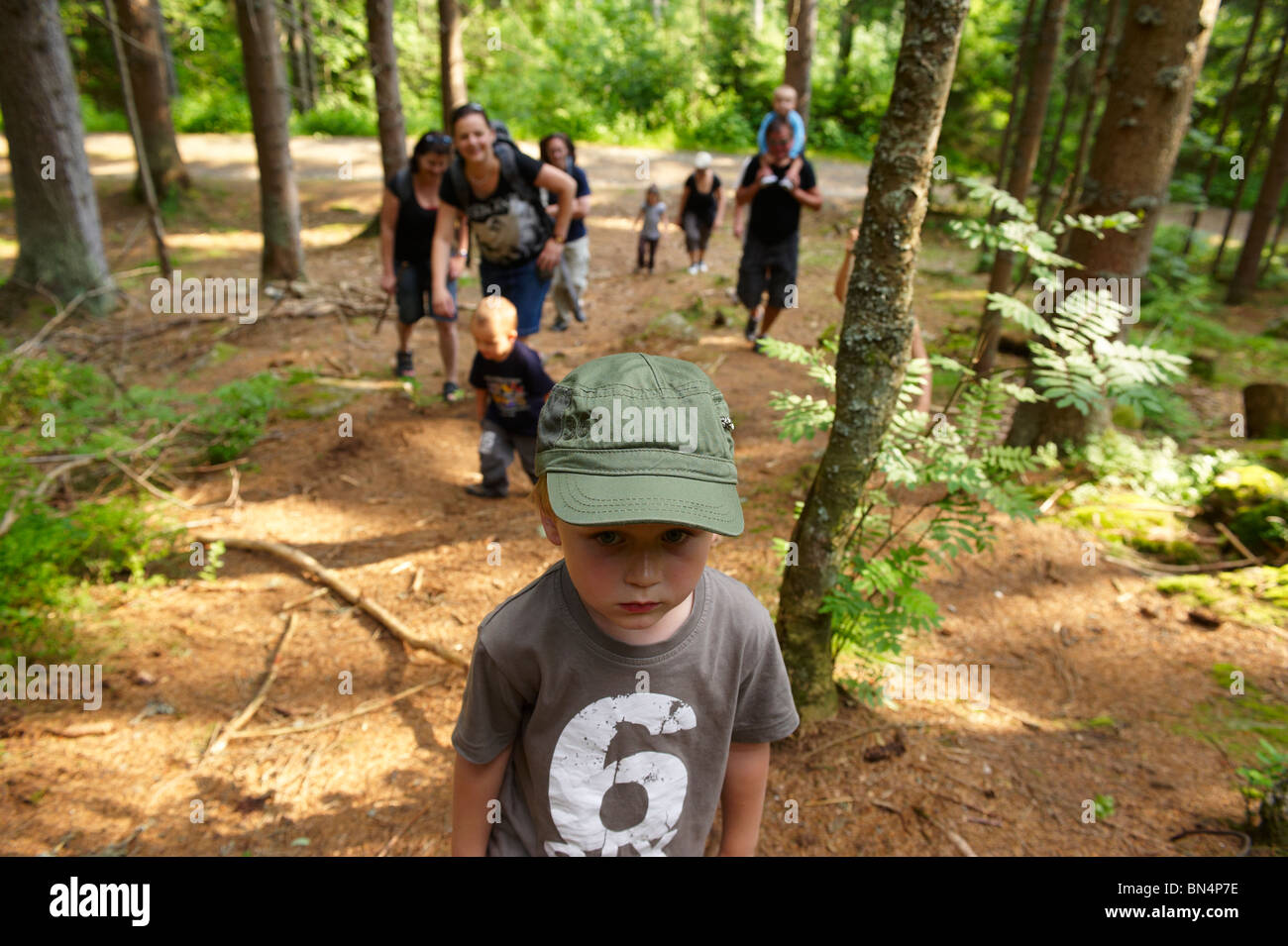 Children exploring in forest - boys playing outdoors Stock Photo - Alamy