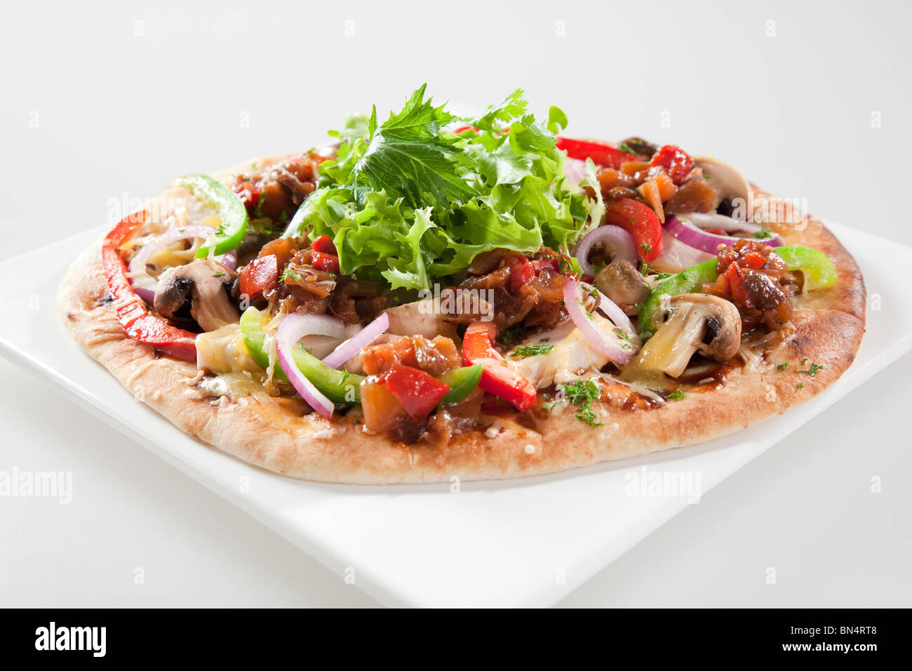 SPICY EGGPLANT AND CAPSICUM PIZZA Stock Photo - Alamy