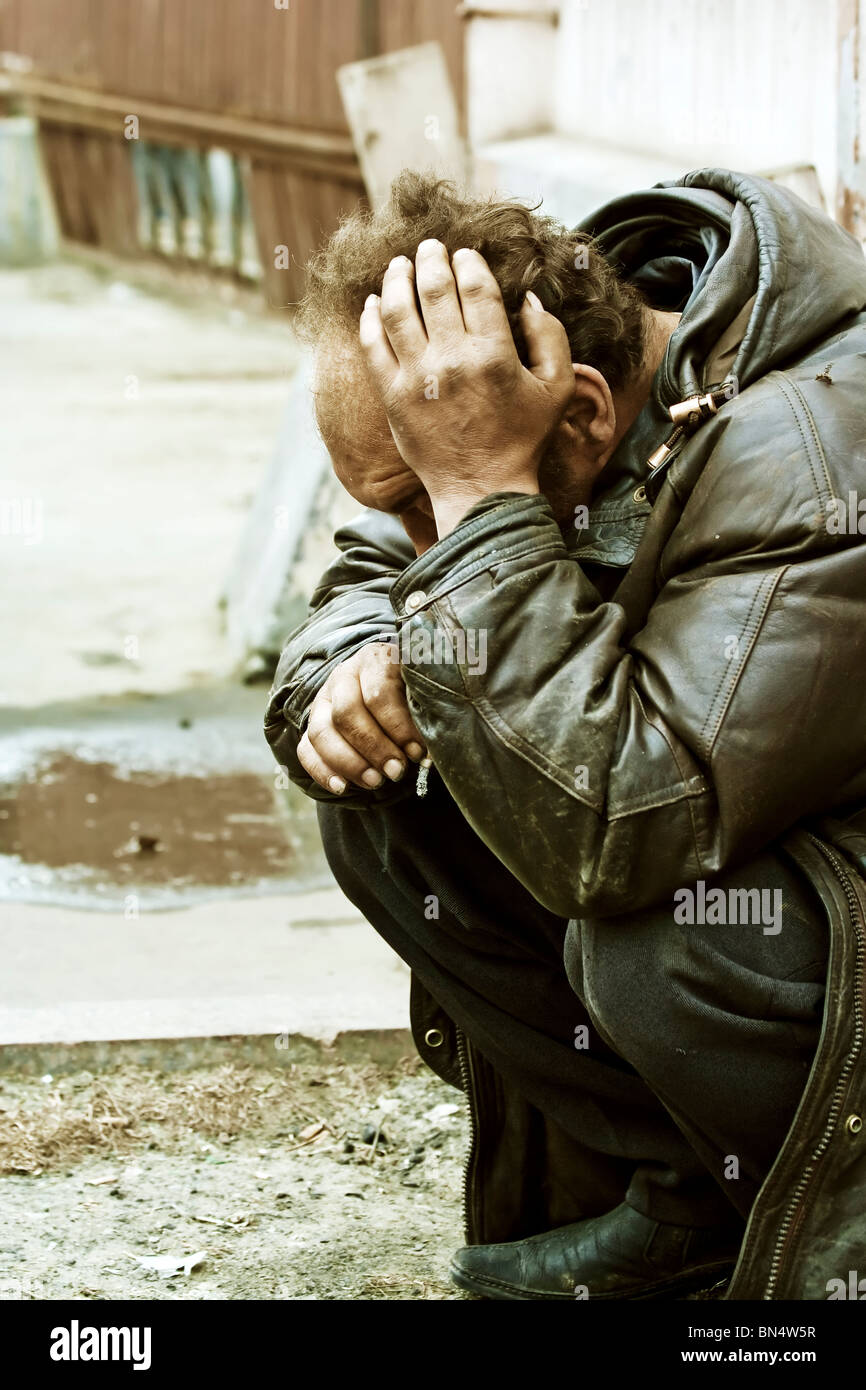 Homeless man in depression Stock Photo - Alamy