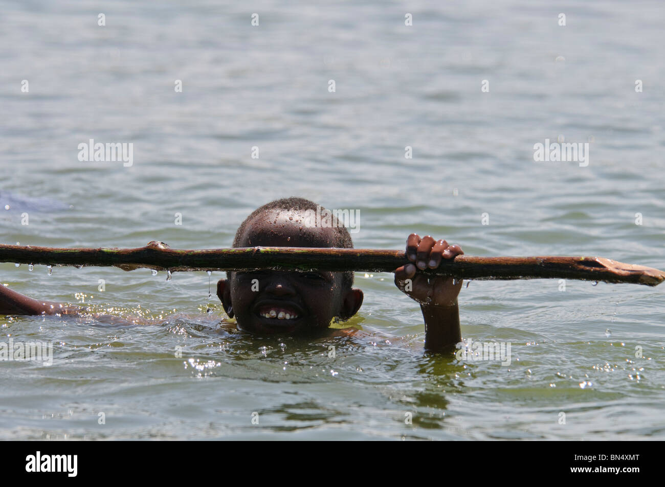 Keeping head above water hi-res stock photography and images - Alamy