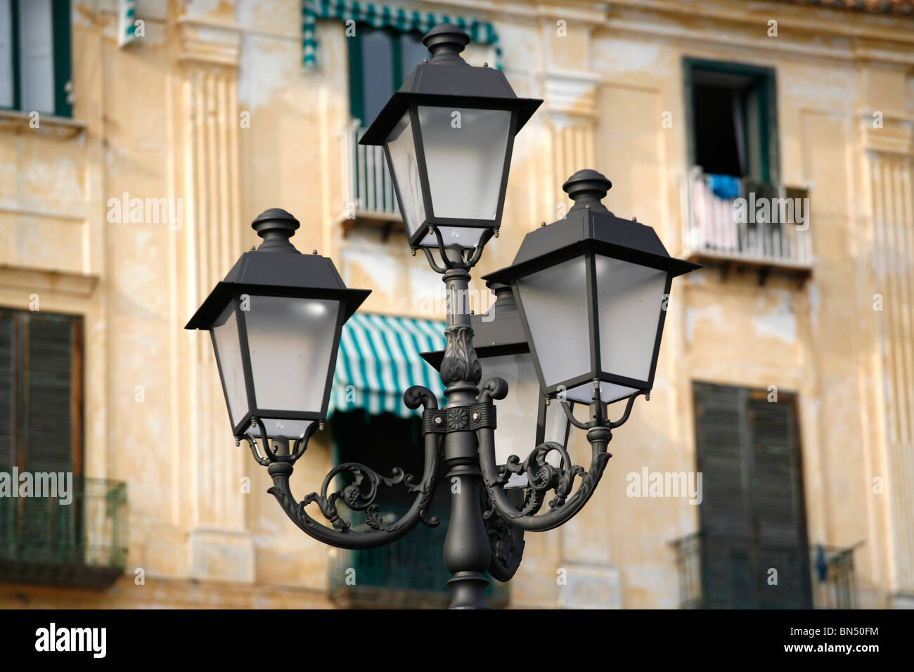 streetlight in front of building in Italy Stock Photo - Alamy