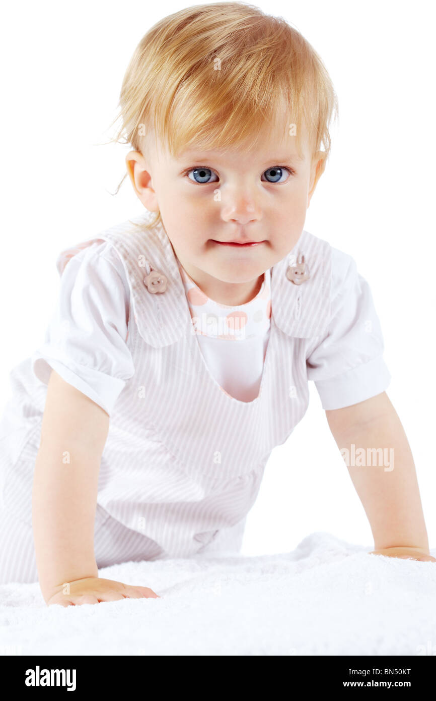 Portrait of small girl looking at camera with serene expression Stock ...
