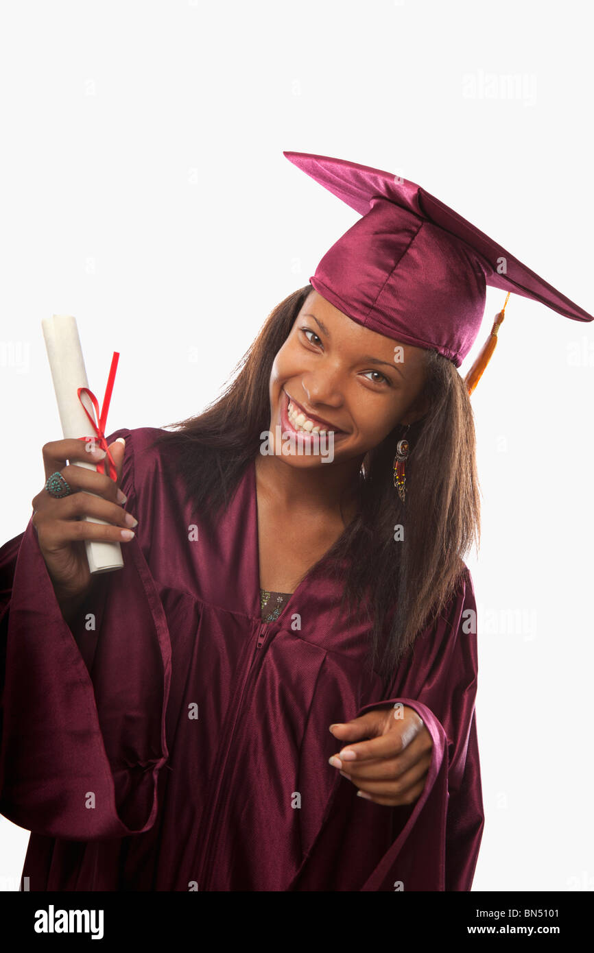 female college graduate in cap and gown with diploma Stock Photo - Alamy