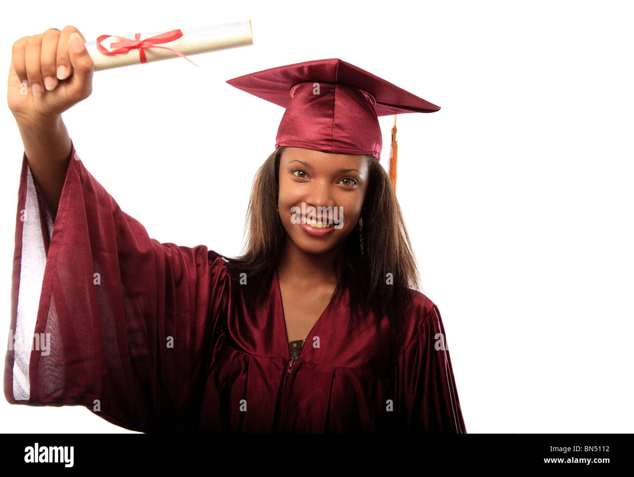 female college graduate in cap and gown with diploma Stock Photo - Alamy