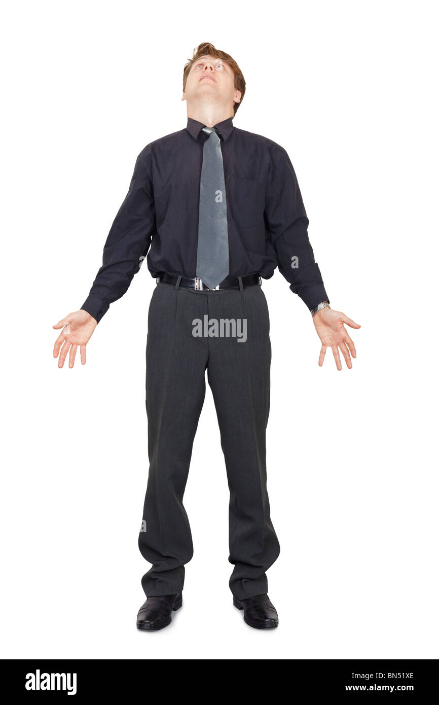Surprised man looks up, isolated on a white background Stock Photo - Alamy