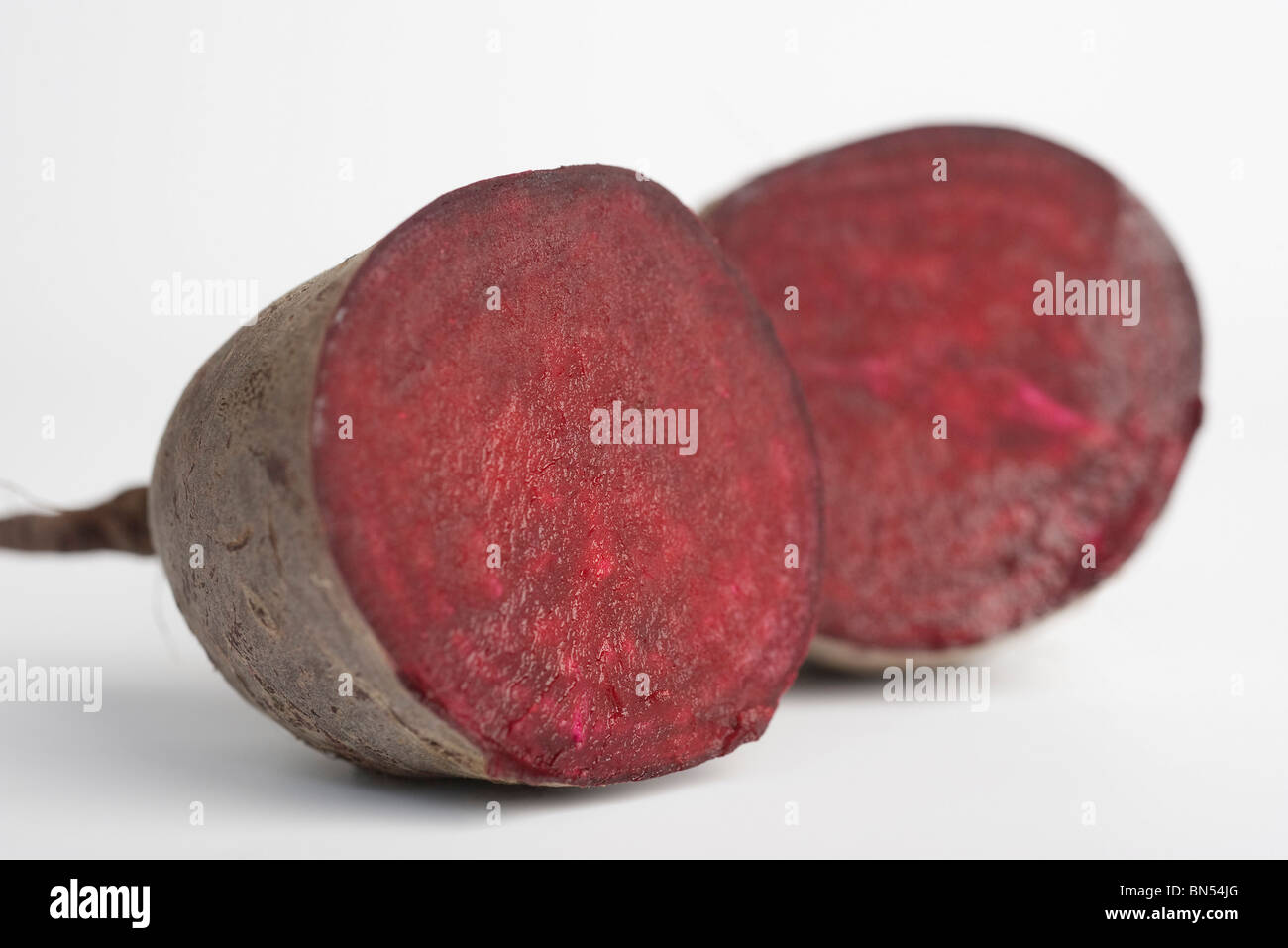 Beet, cut in half Stock Photo - Alamy