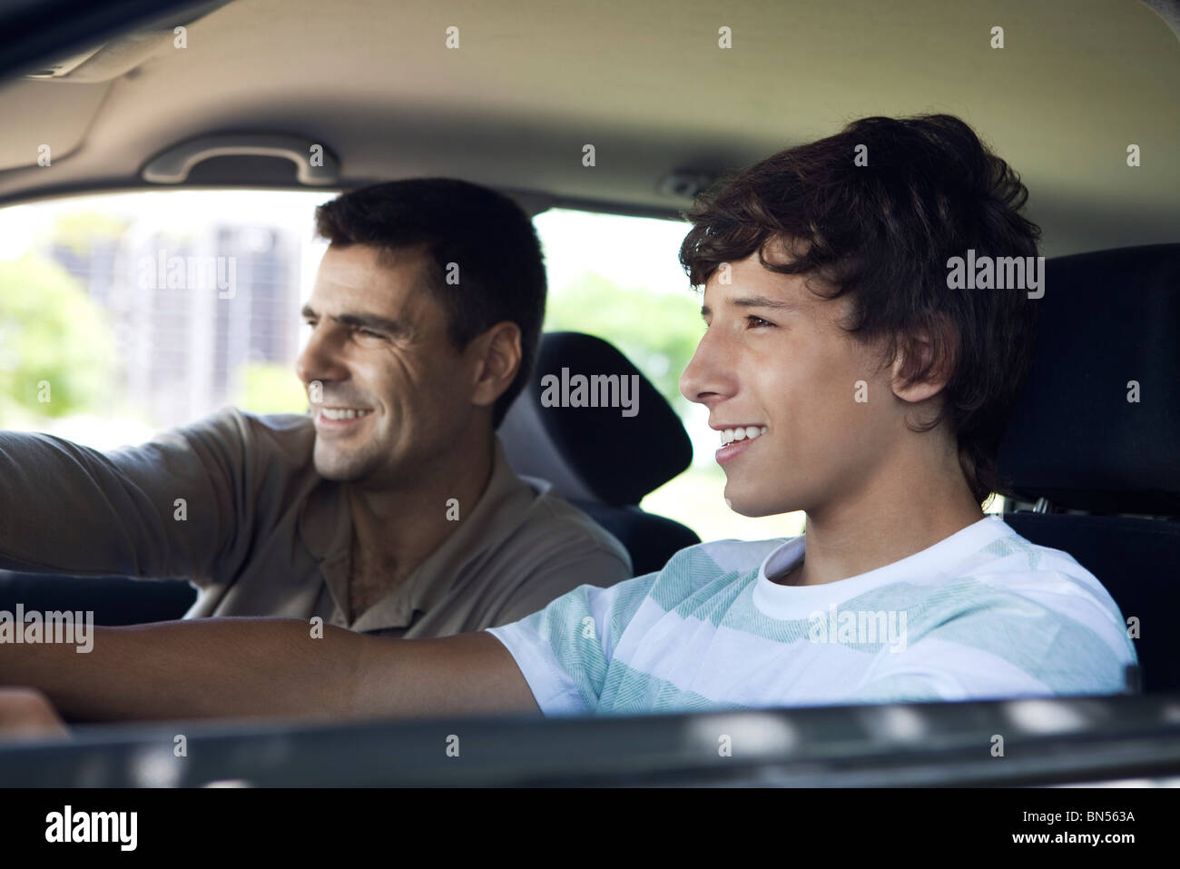 Father teaching son to drive Stock Photo - Alamy