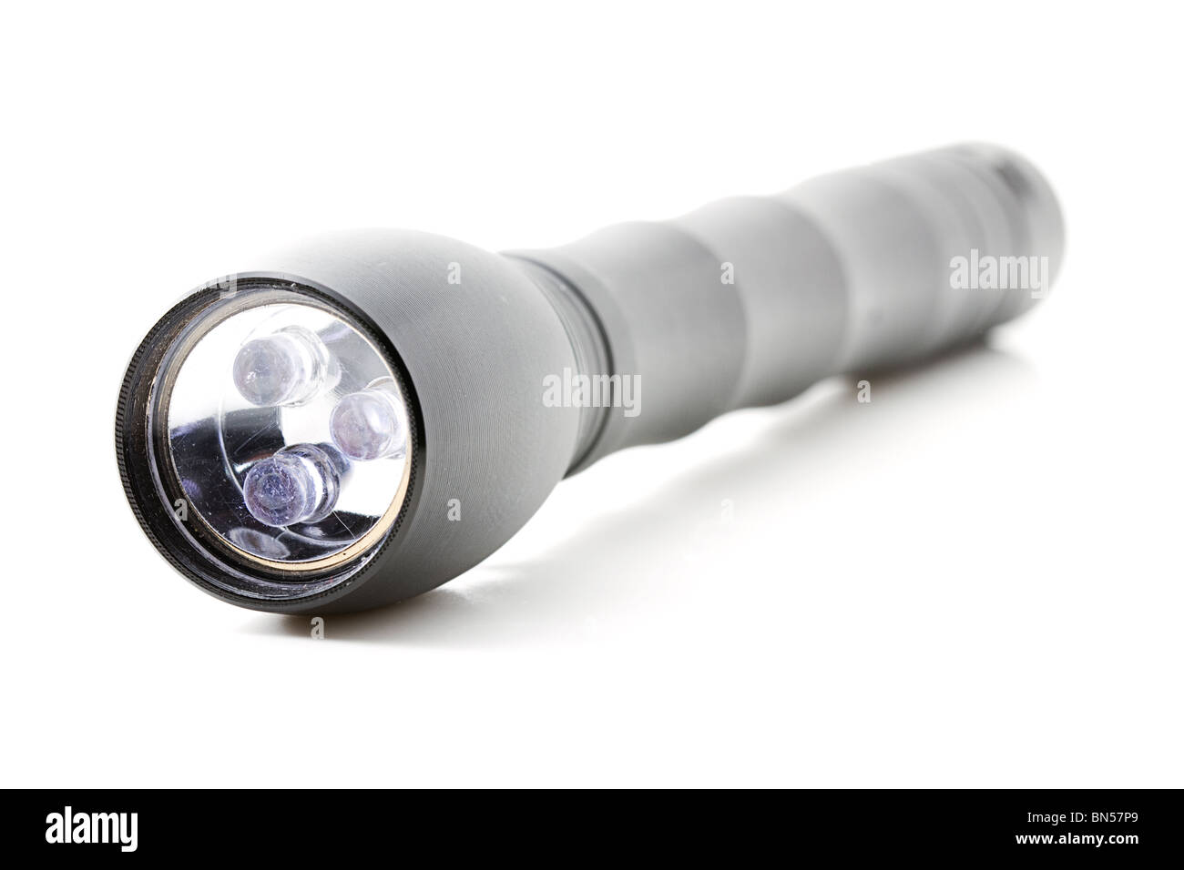 one black flashlight on white background Stock Photo - Alamy