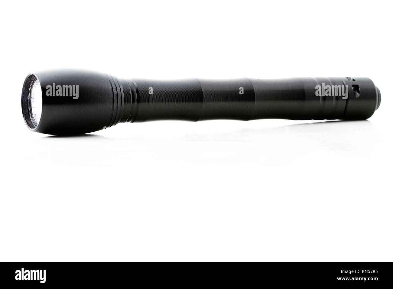 one flashlight from the side on white background Stock Photo - Alamy