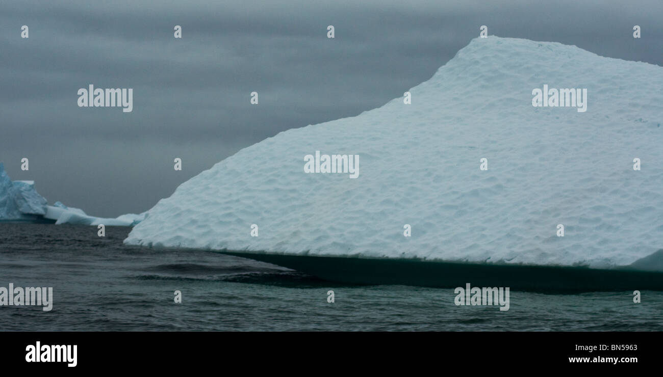 Textured iceberg with eroded base Stock Photo - Alamy