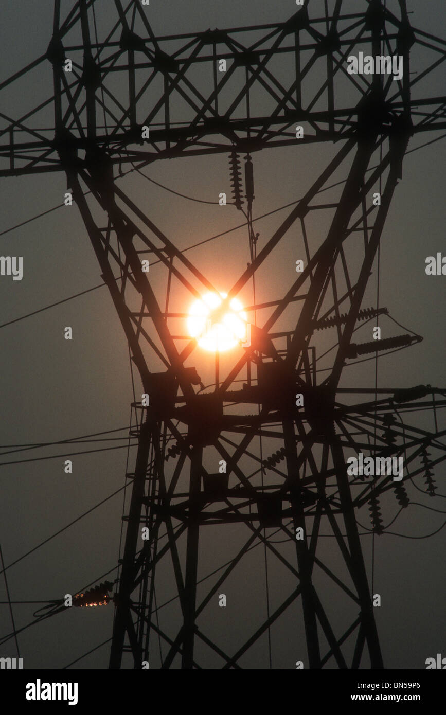 High tension electric power lines at sunset Stock Photo - Alamy