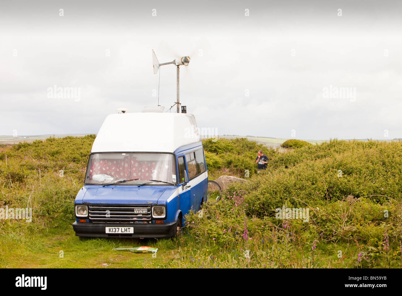 A travellers camper van with a wind turbine used to power a computer ...