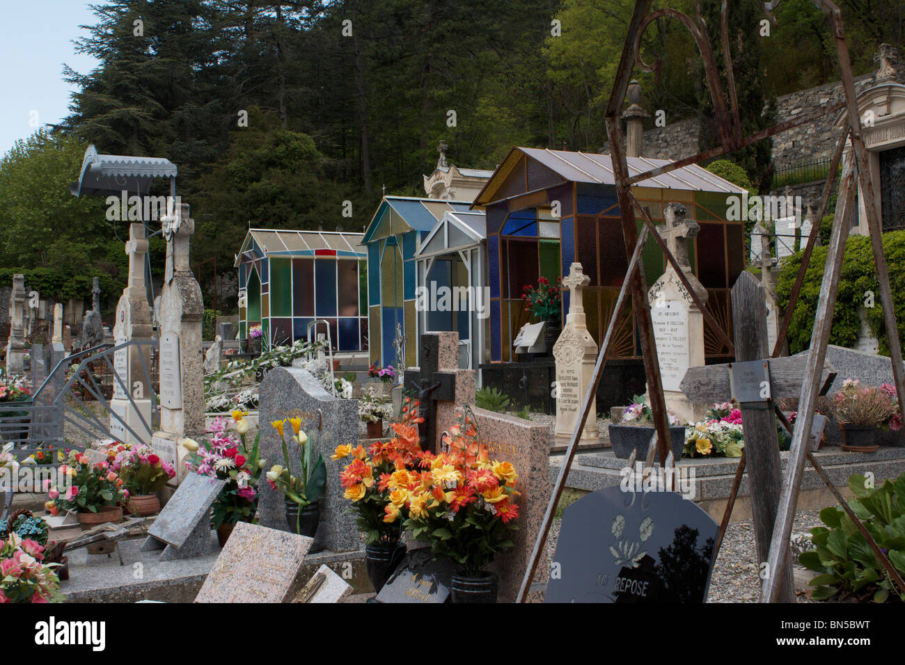 French cemetery with stained-glass shed-like family tombs Stock Photo ...