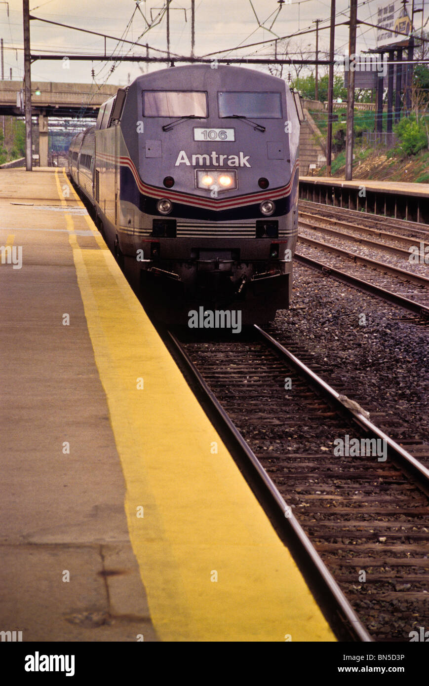 Amtrak engine enters Lancaster PA RR station terminal Stock Photo - Alamy