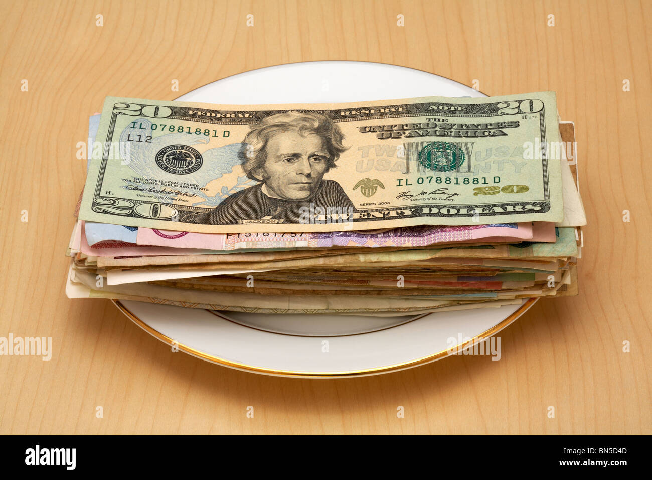 Money on plate hi-res stock photography and images - Alamy